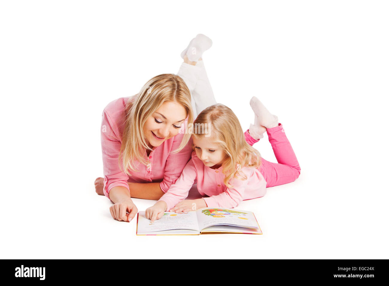 happy mother and child reading a book together Stock Photo - Alamy