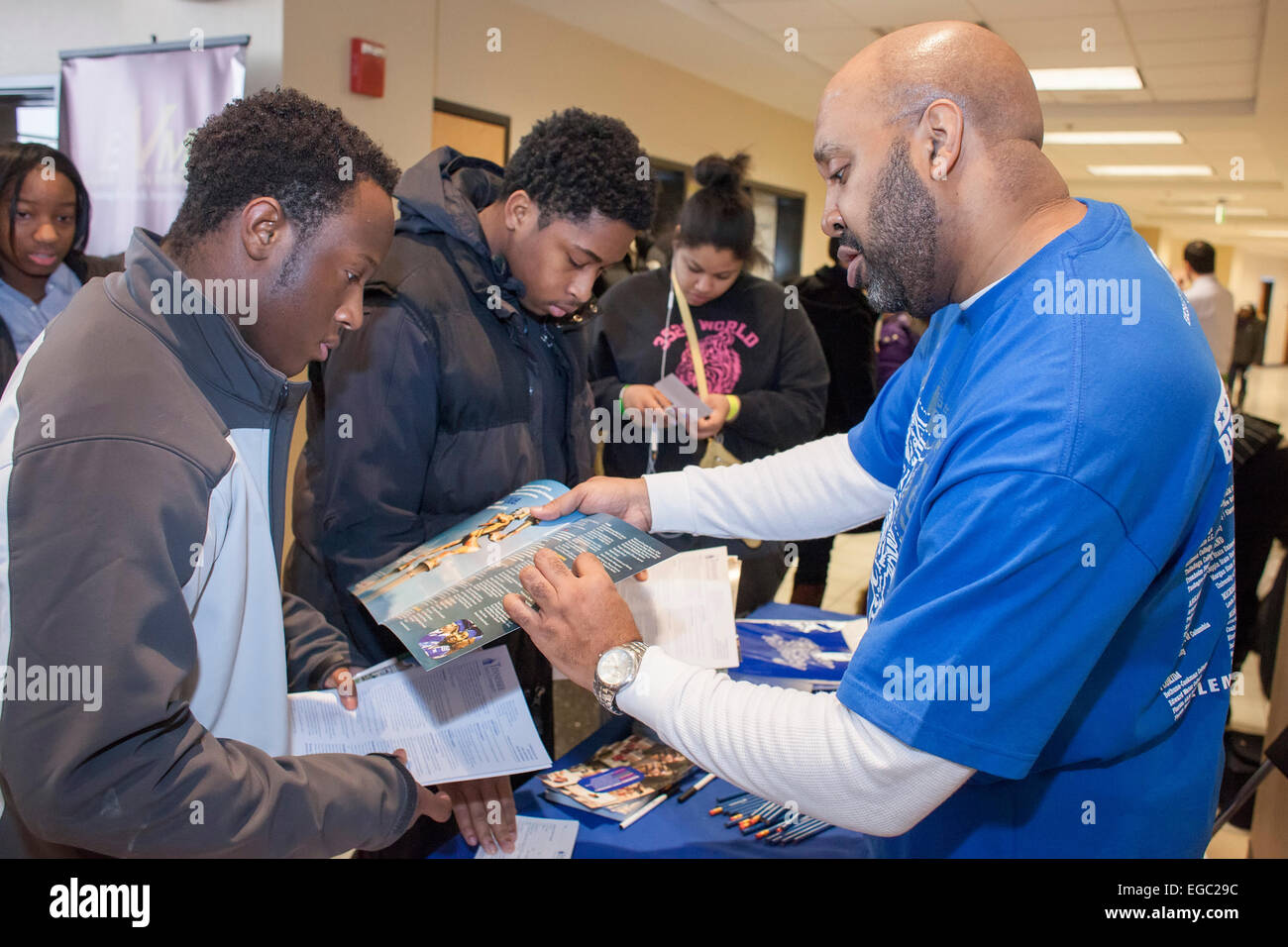 High School Students and Parents Attend a College Fair Stock Photo - Alamy