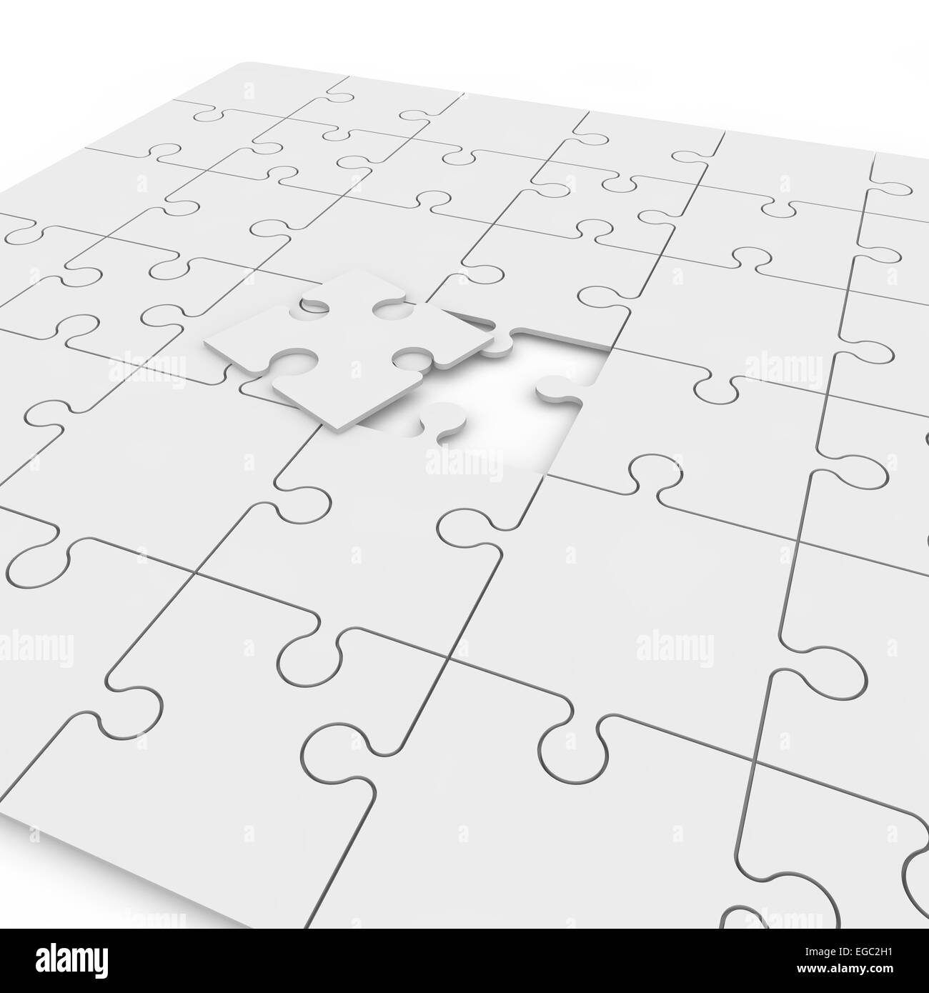 Dropped white puzzle of puzzles Stock Photo - Alamy