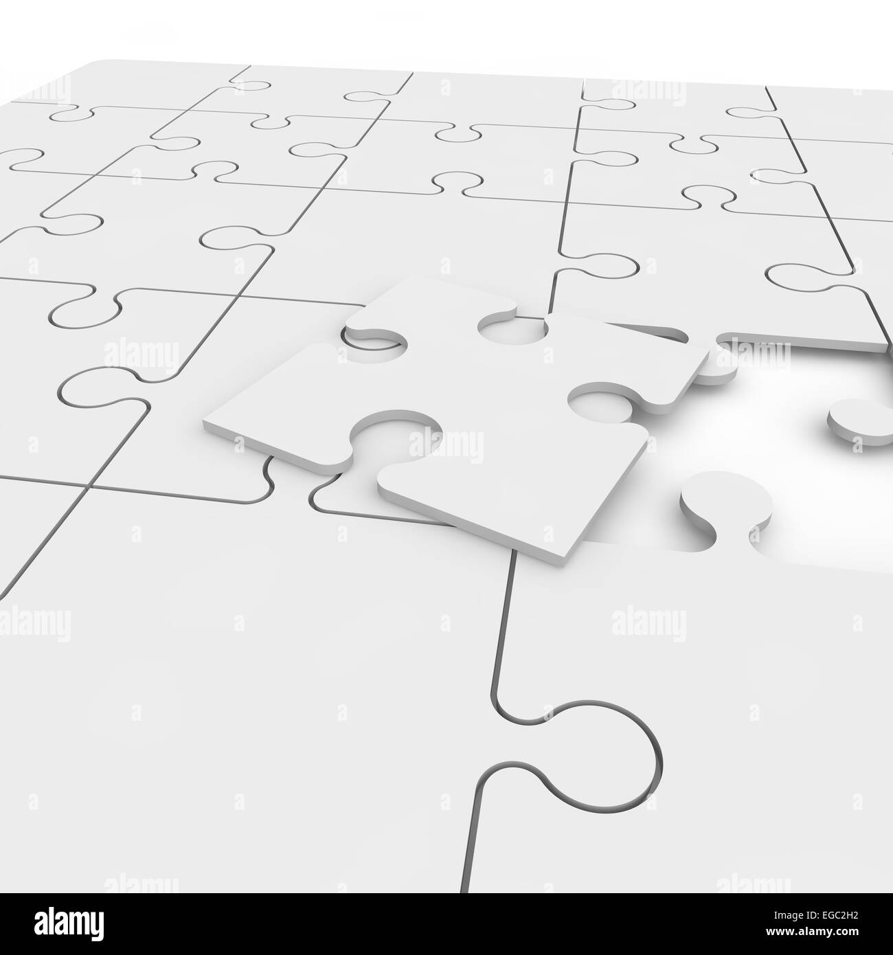 Dropped white puzzle of puzzles Stock Photo - Alamy