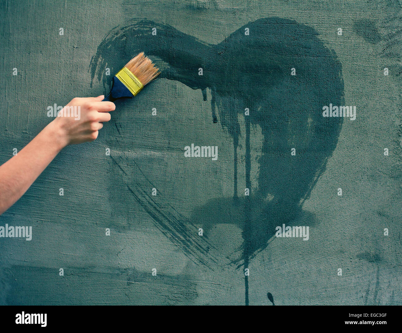 male hand painted heart on concrete wall Stock Photo - Alamy