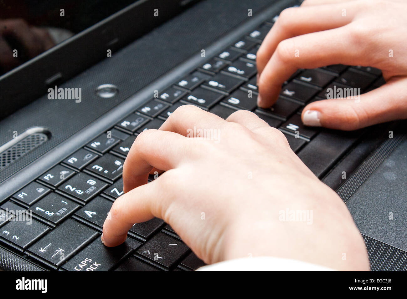 children's hands typing on a laptop keyboard Stock Photo - Alamy