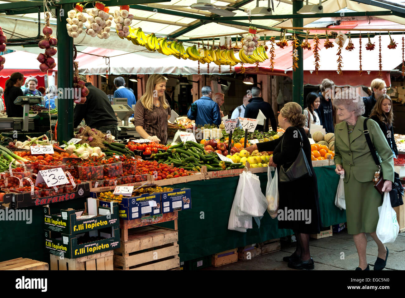 Shoppers at produce stand, farmers market, Venice, Italy Stock Photo ...