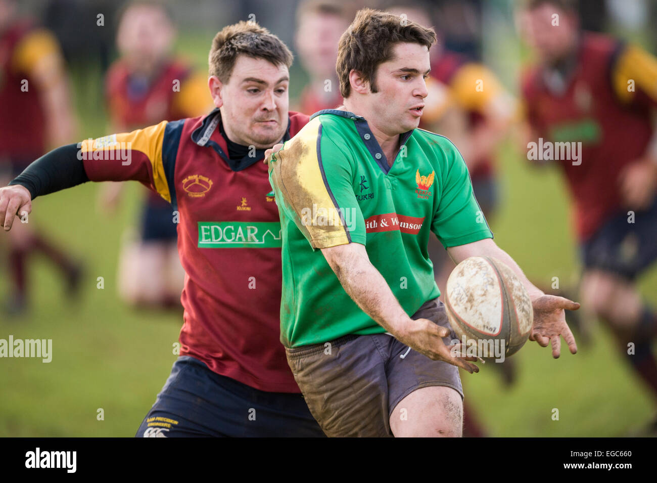 Rugby player passing ball Stock Photo - Alamy