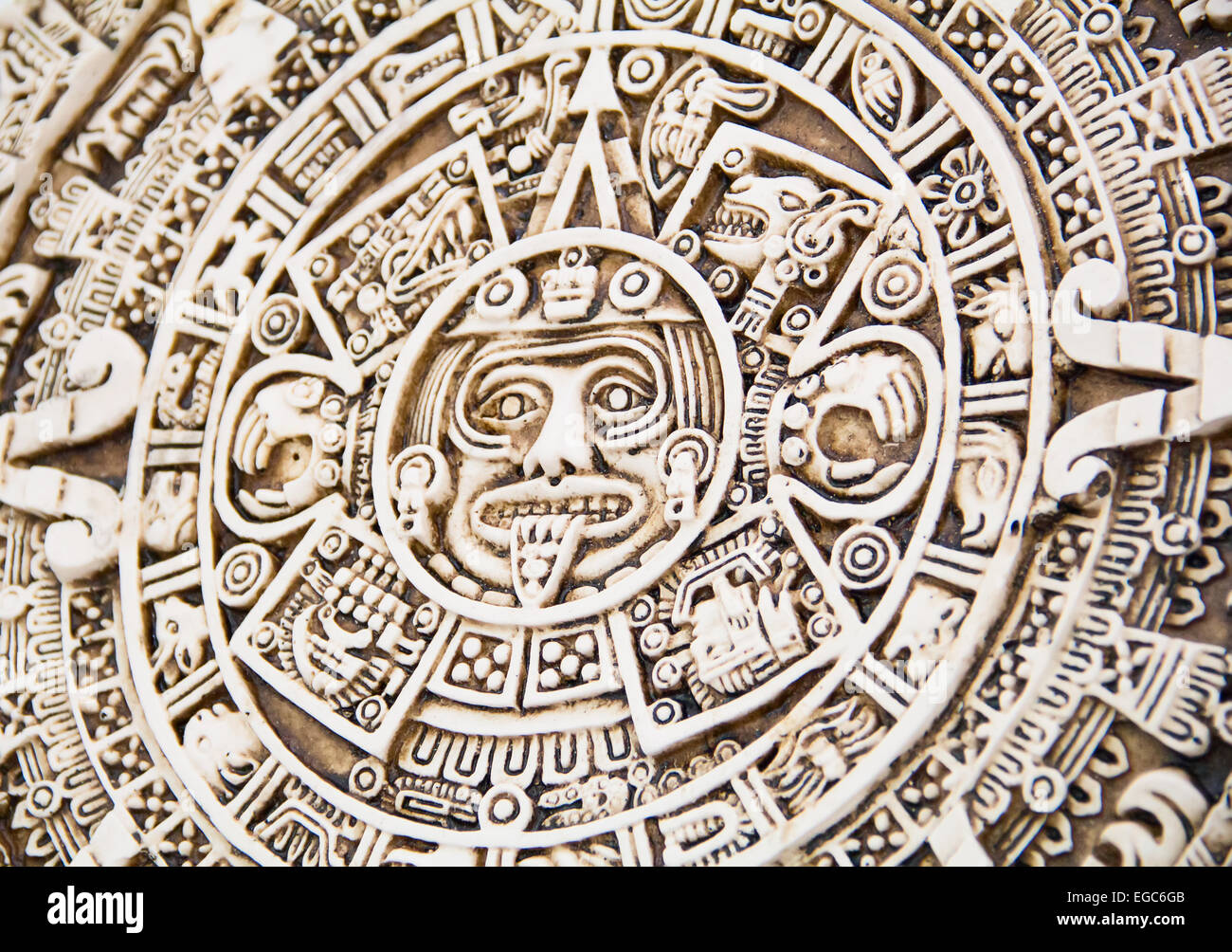 Fragment of the Mayan symbolic sun carved on the stone Stock Photo - Alamy