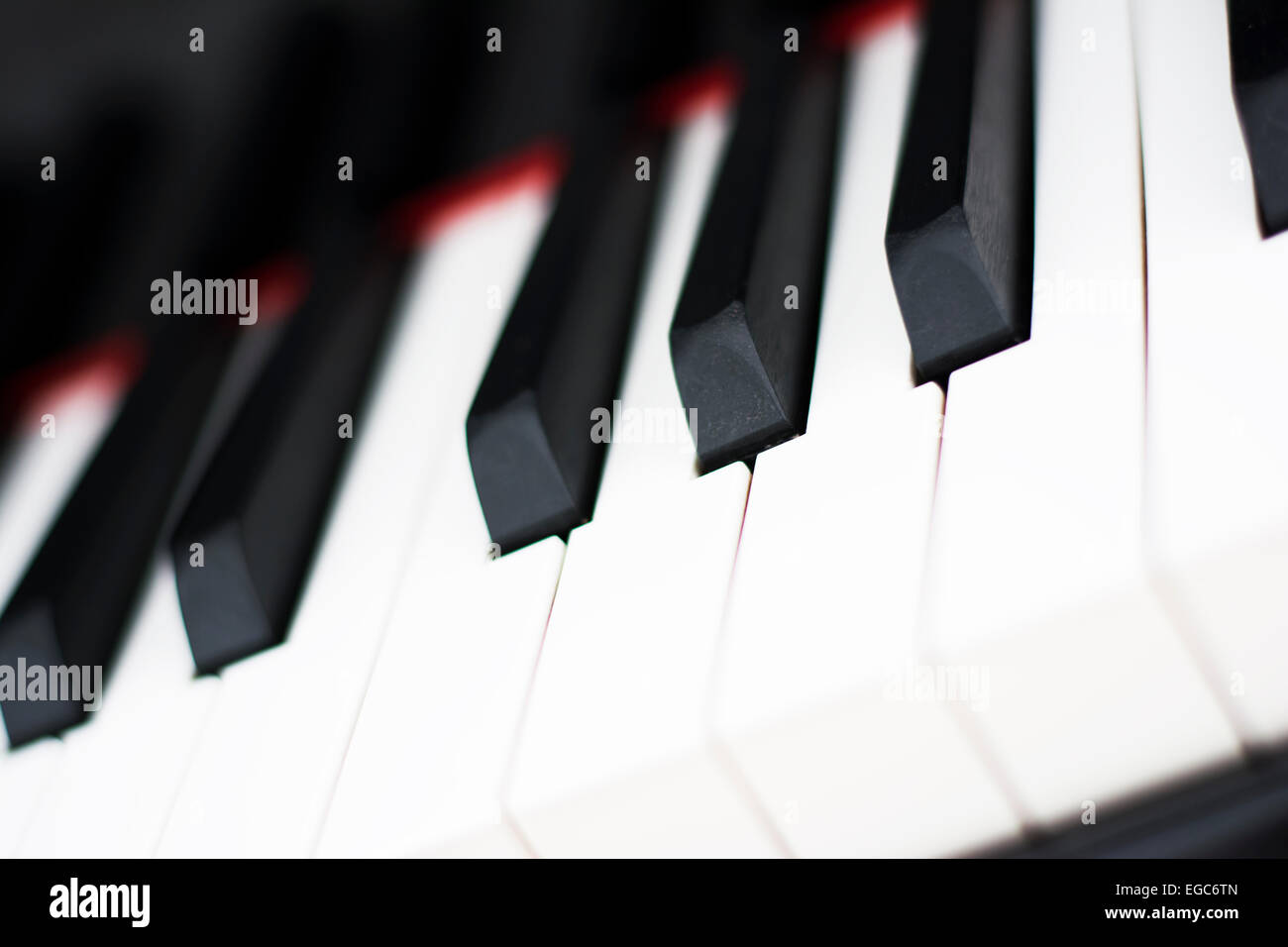 Closeup of a concert piano keyboard in rotation effect Stock Photo - Alamy