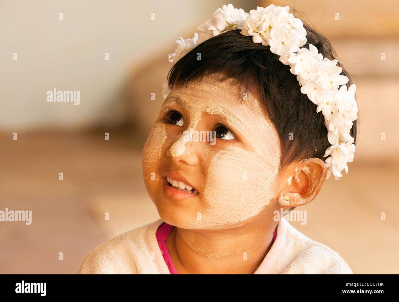 A young Burmese girl age aged 6 years wearing thanaka ( Thanakha ...