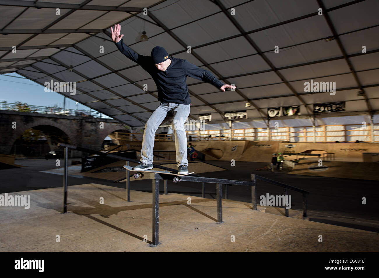 Skater in skatepark jumping Stock Photo - Alamy