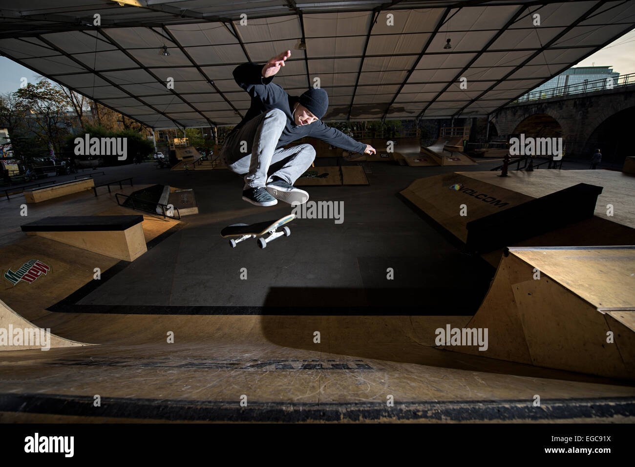 Skater in skatepark jumping Stock Photo - Alamy