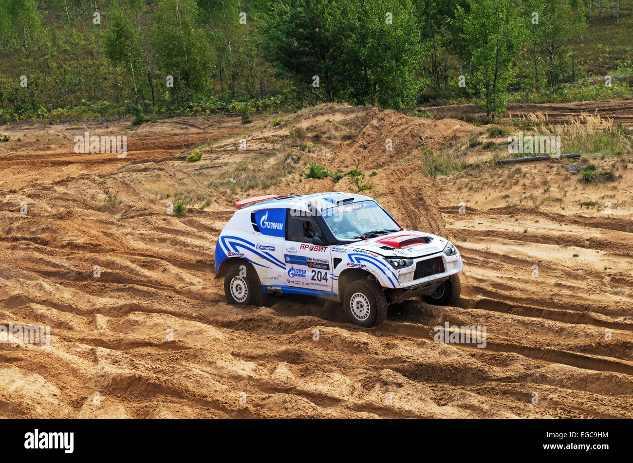 Races on a rally-raid on sandy dunes. Rally-raid Baha "Belarus" 2014 ...