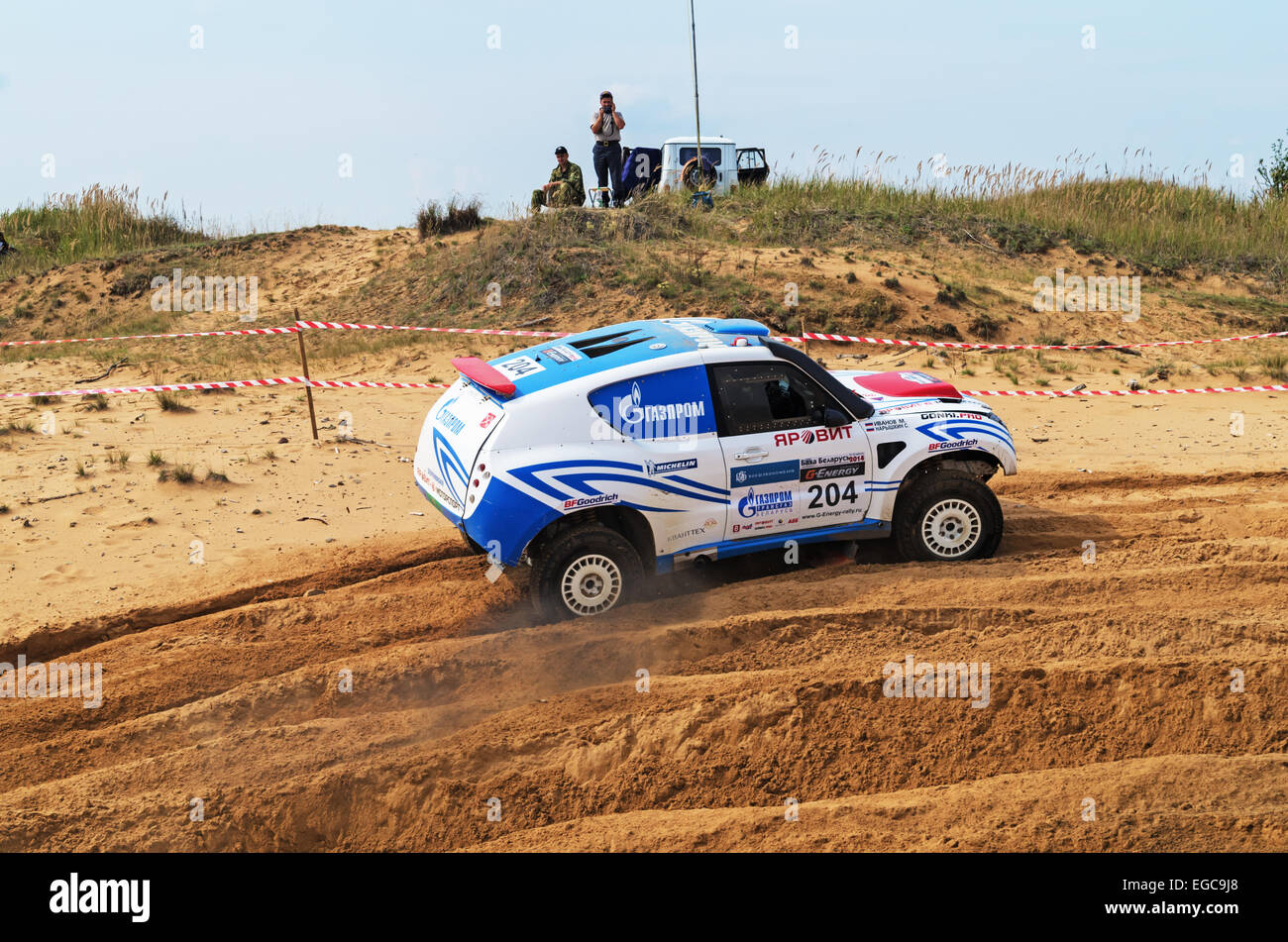 Races on a rally-raid on sandy dunes. Rally-raid Baha "Belarus" 2014 ...