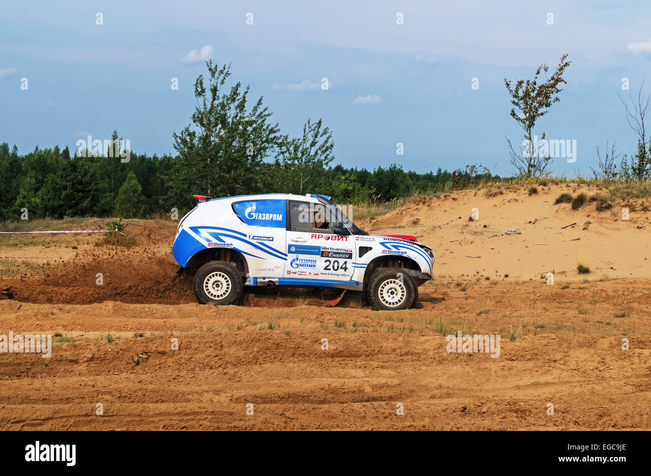 Races on a rally-raid on sandy dunes. Rally-raid Baha "Belarus" 2014 ...