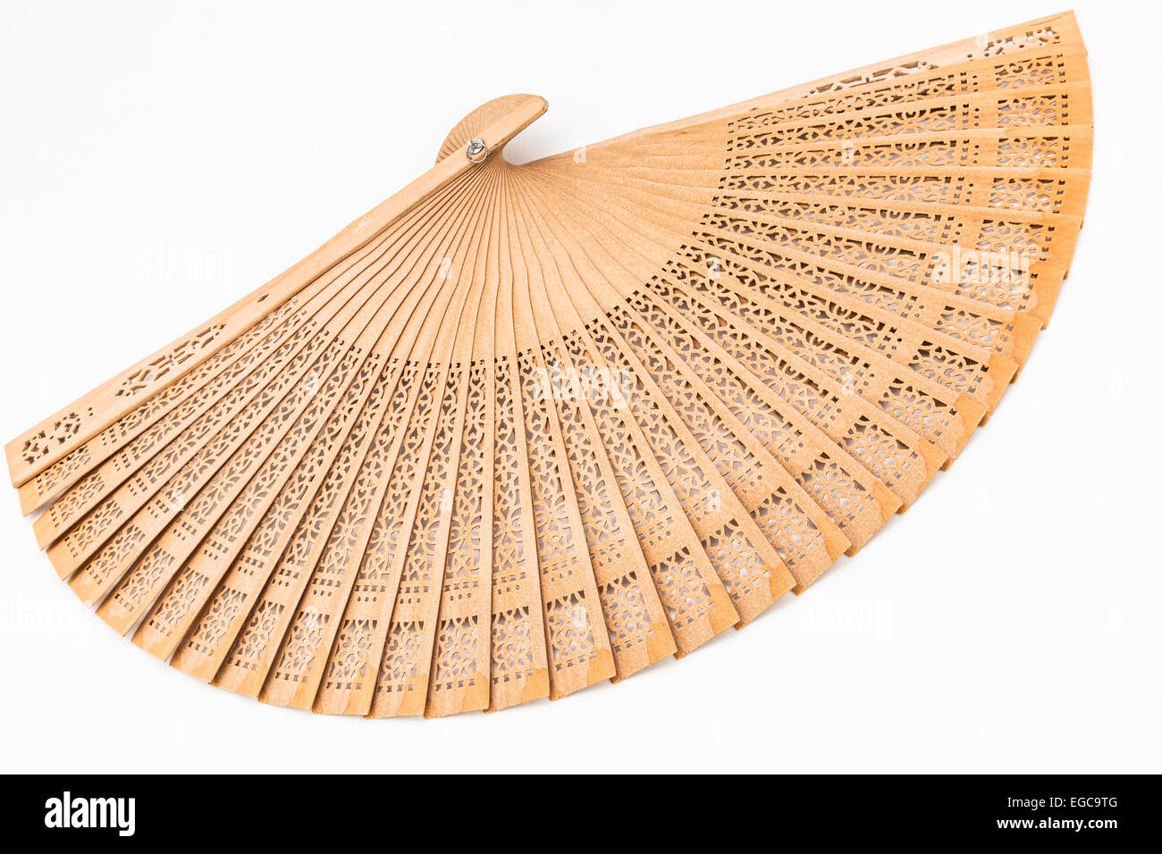 A wood spanish fan on a white background Stock Photo - Alamy