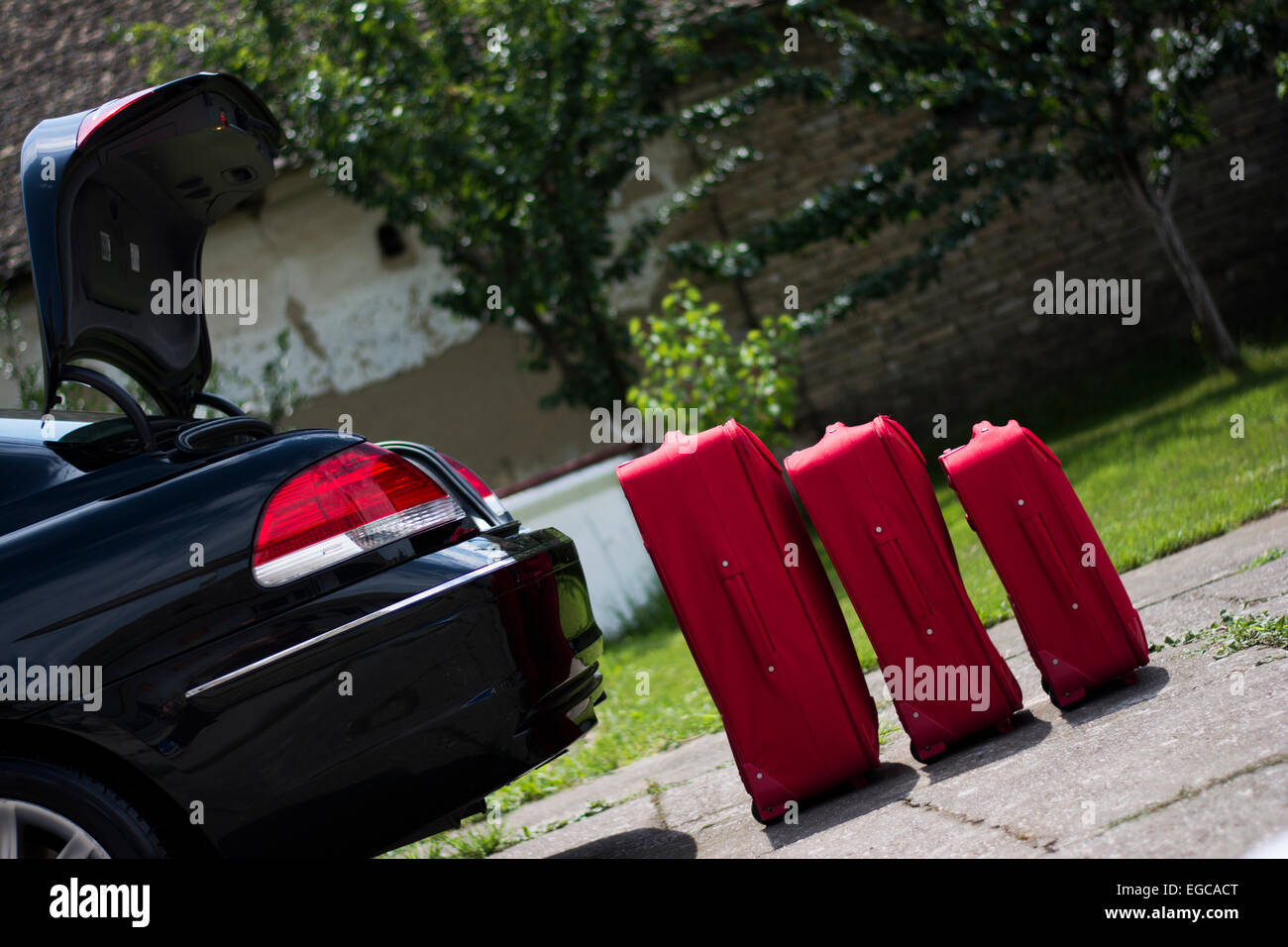 Packed suitcases hi-res stock photography and images - Alamy