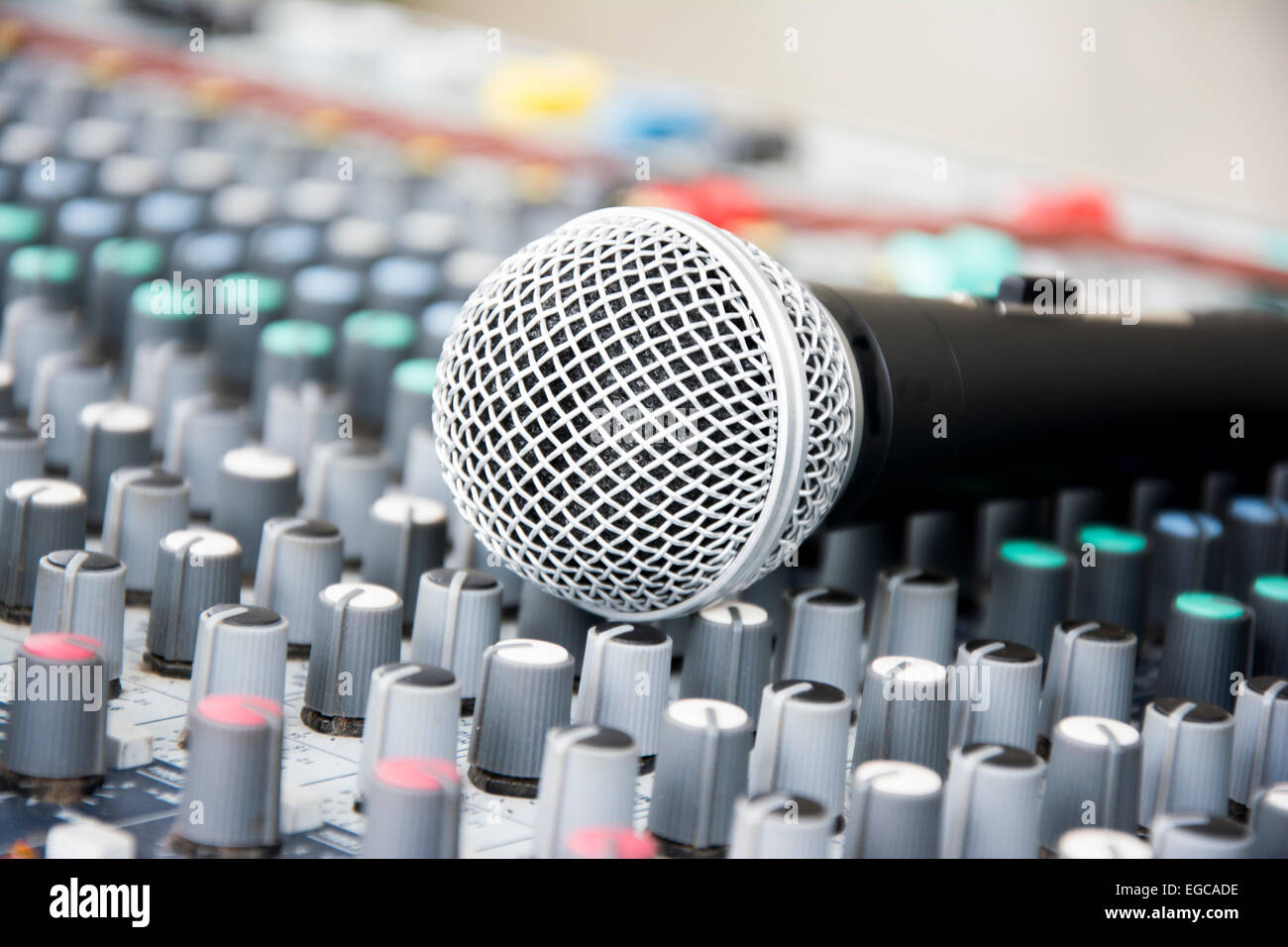 Microphone on a console ready for concert Stock Photo - Alamy