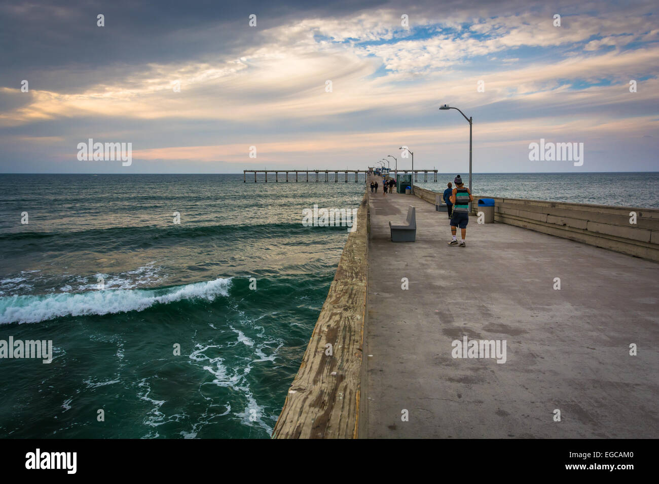 The fishing pier and waves in the Pacific Ocean in Ocean Beach ...