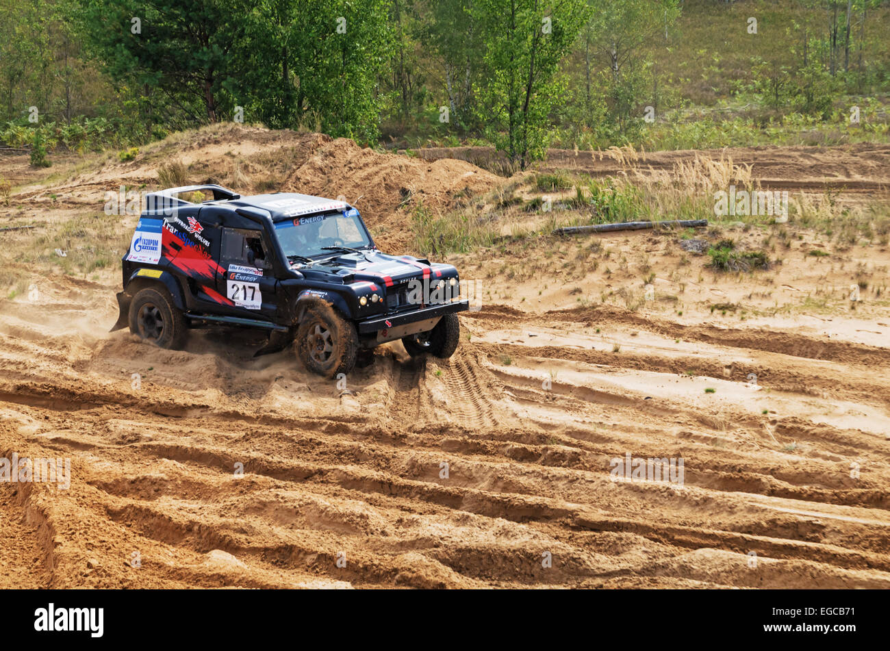 Races on a rally-raid on sandy dunes. Rally-raid Baha "Belarus" 2014 ...