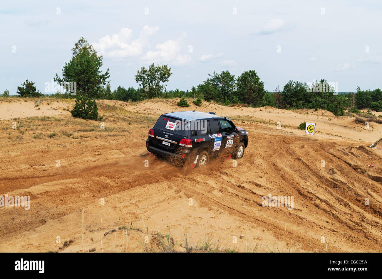 Races on a rally-raid on sandy dunes. Rally-raid Baha "Belarus" 2014 ...