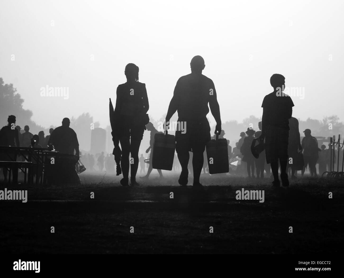 Lots of people in the dust Stock Photo - Alamy