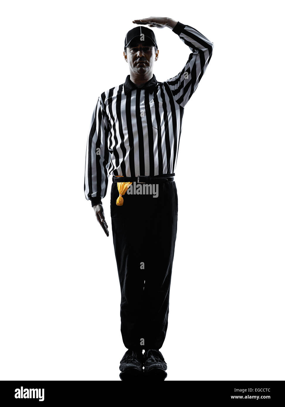 american football referee gestures uncatchable pass in silhouette on ...