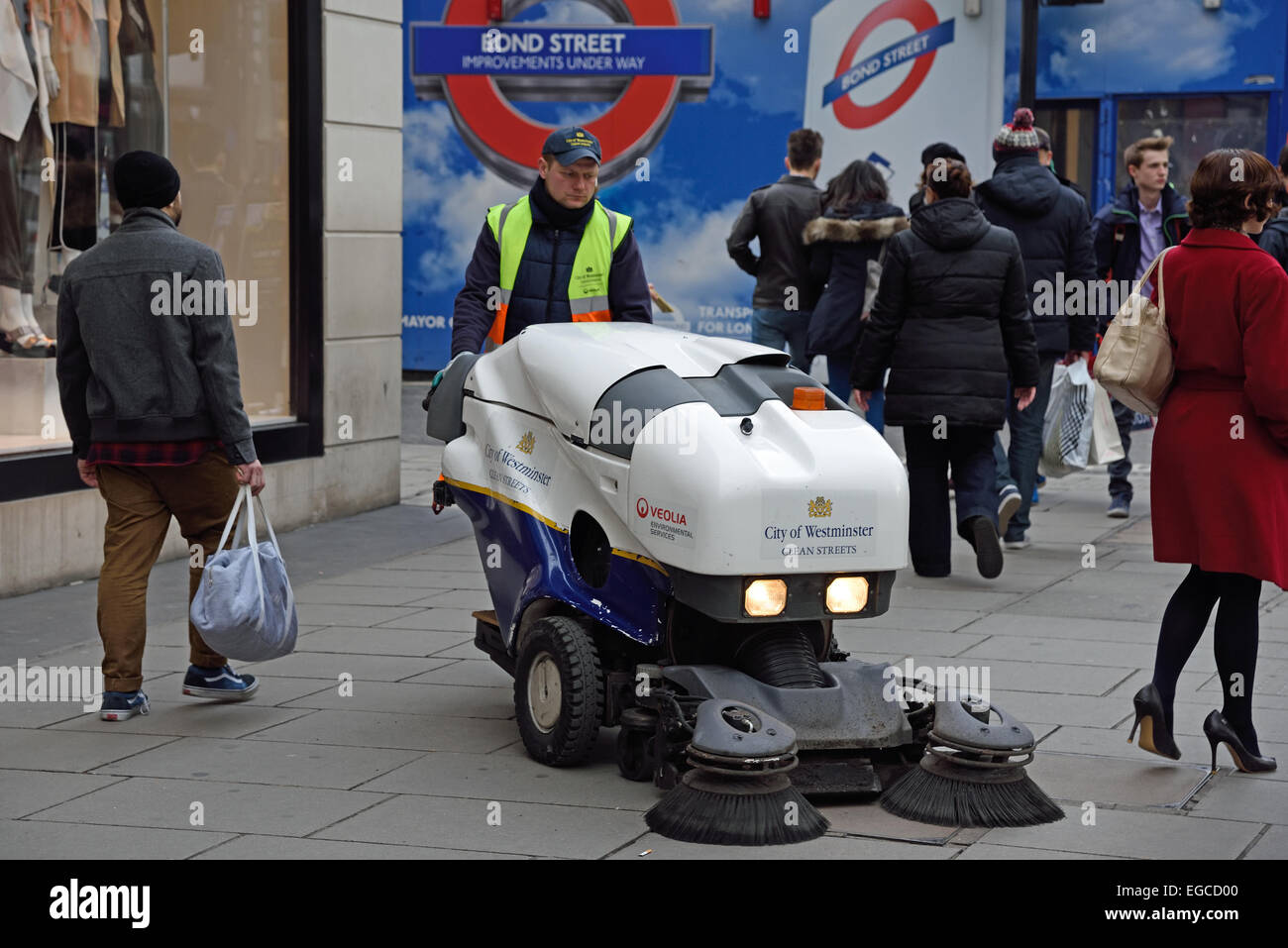 Pavement cleaning in Oxford Street London W1, UK Stock Photo - Alamy