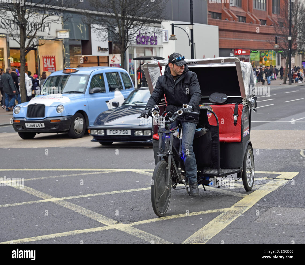 A bicycle rickshaw in Oxford Street, London Stock Photo - Alamy