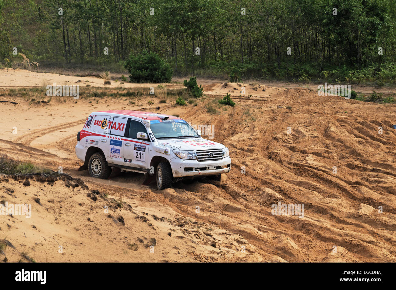 Races on a rally-raid on sandy dunes. Rally-raid Baha "Belarus" 2014 ...