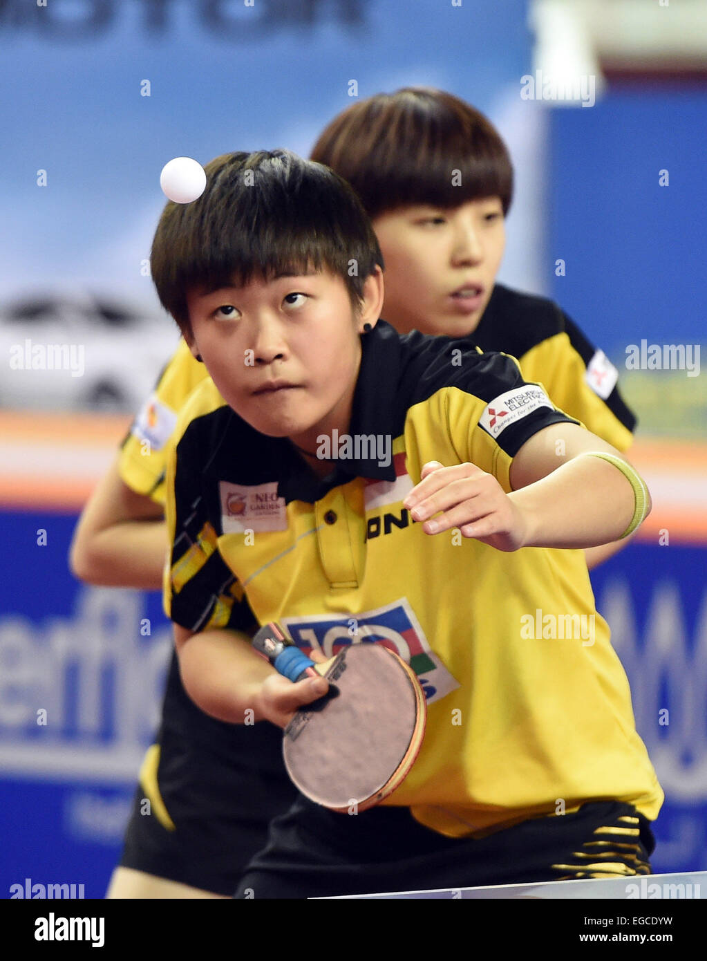 Doha, Qatar. 22nd Feb, 2015. Singapore's Lin Ye(front)/Zhou Yihan ...