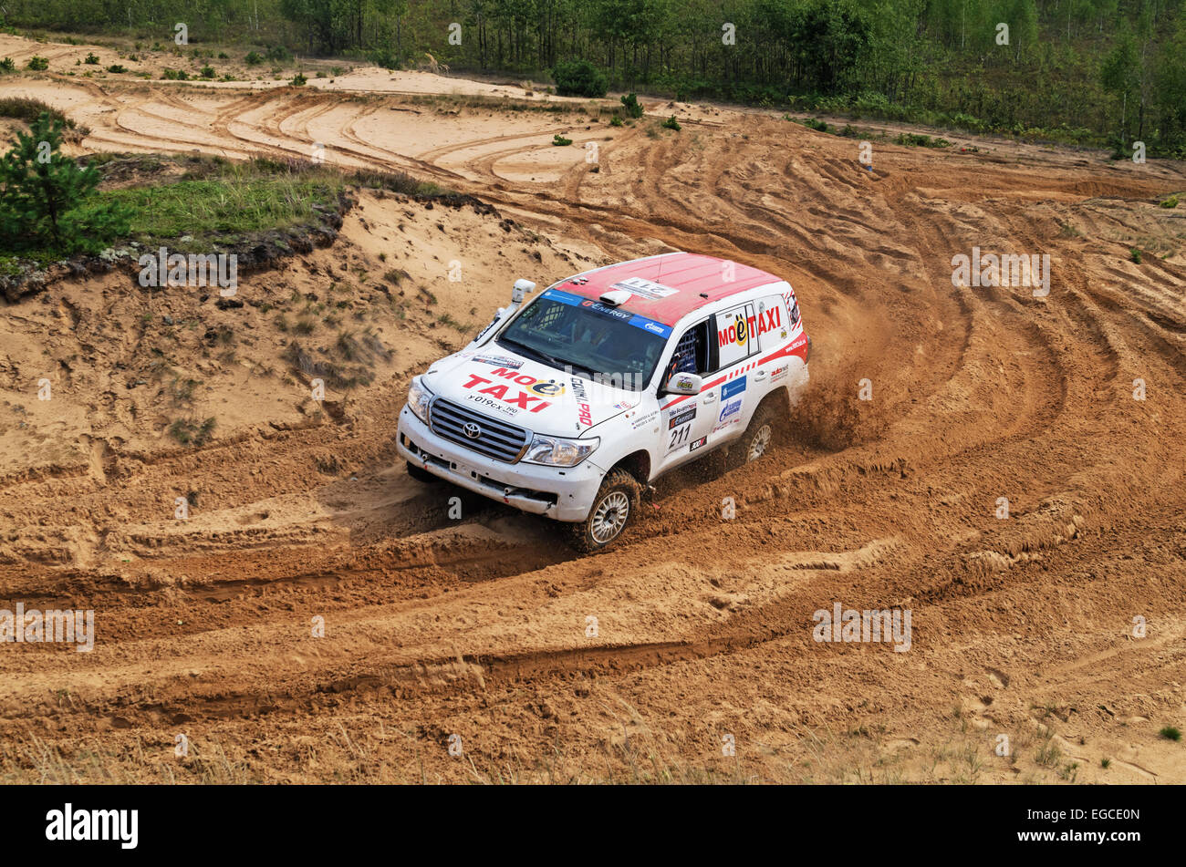 Races on a rally-raid on sandy dunes. Rally-raid Baha "Belarus" 2014 ...