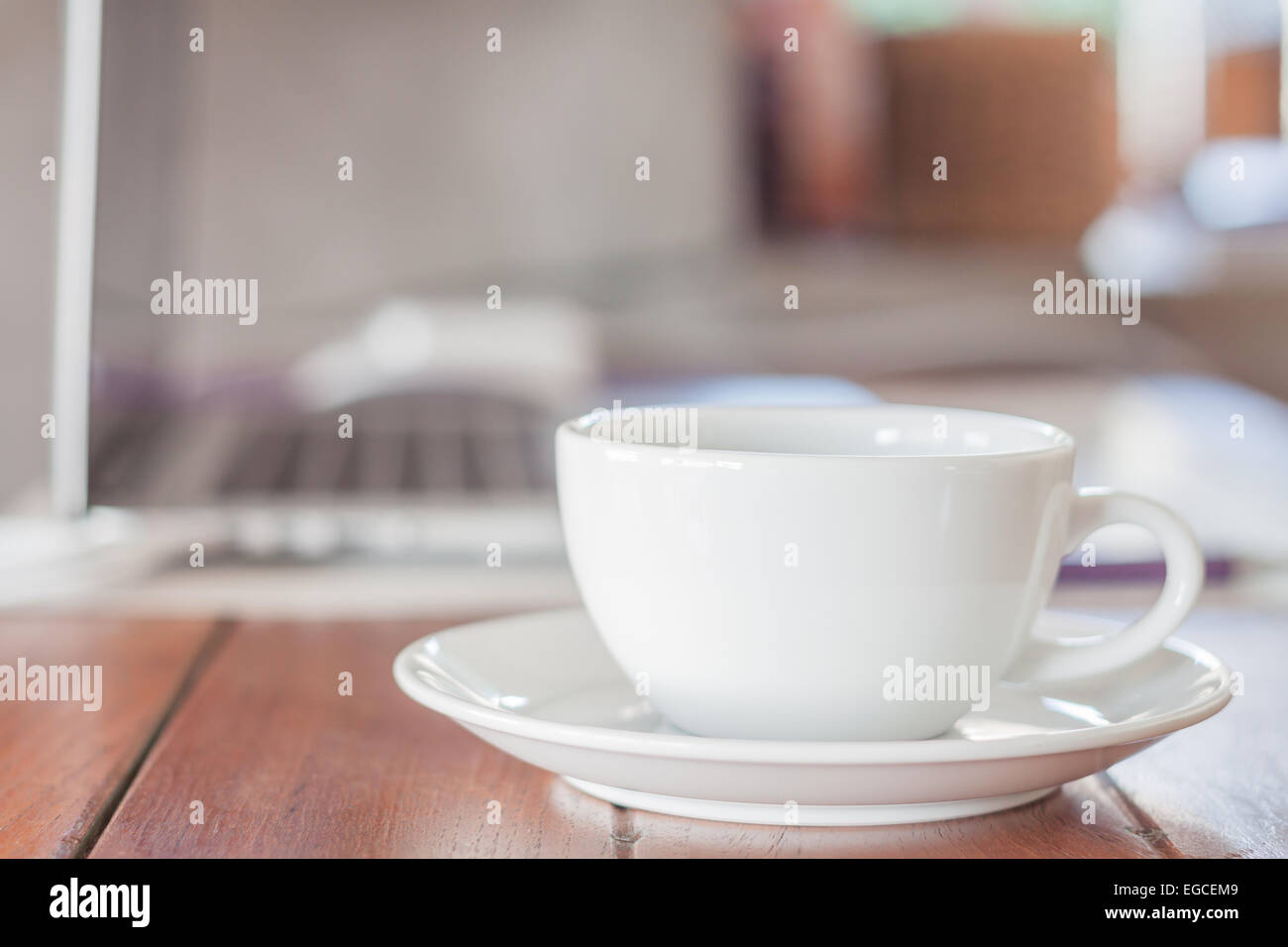 White coffee cup on work station, stock photo Stock Photo - Alamy