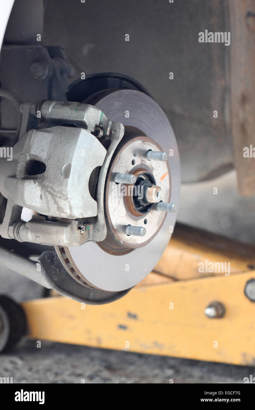 repaired equipment of car brake disc in the garage Stock Photo - Alamy