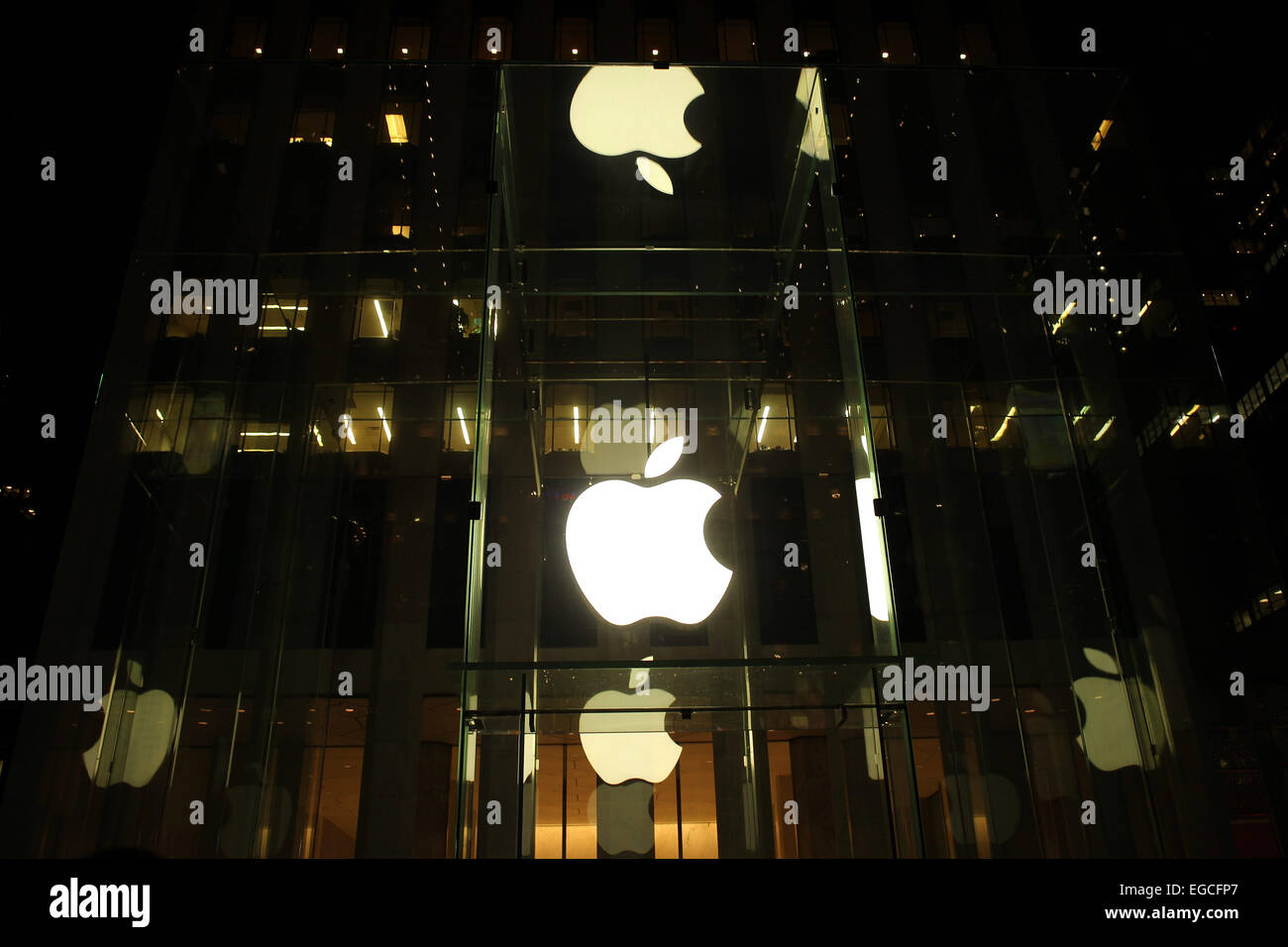 The Apple Logo, on the glass fronted Apple Store, surrounded by the ...