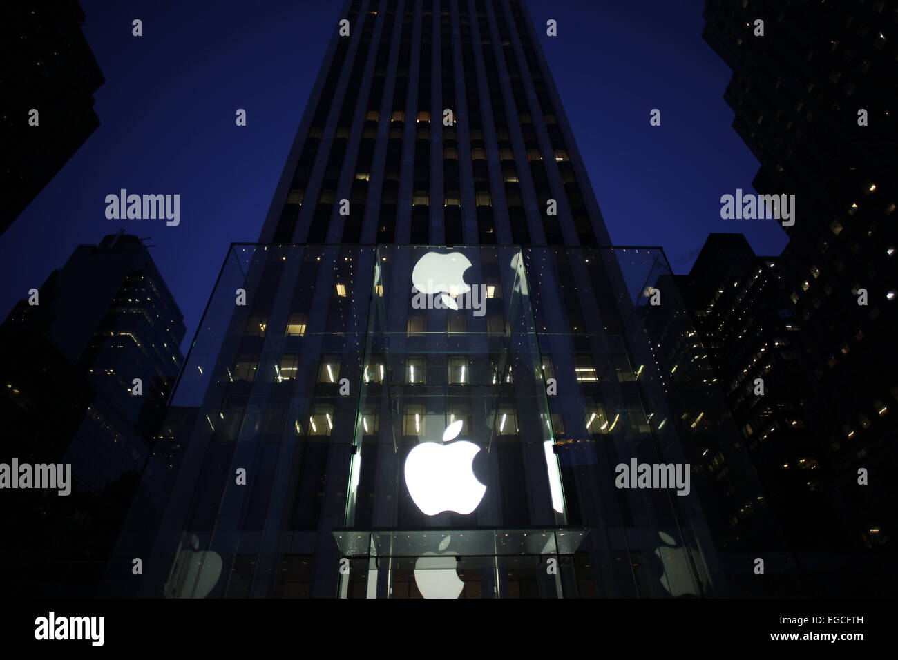 The Apple Logo, on the glass fronted Apple Store, surrounded by the ...