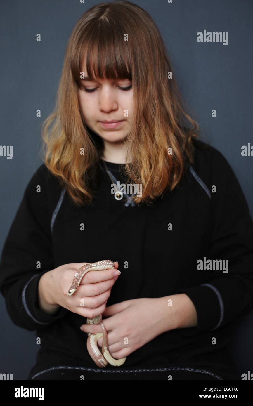 Girl holding snake hi-res stock photography and images - Alamy