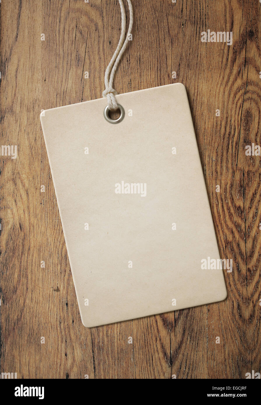 price tag or label on old wooden table background Stock Photo - Alamy