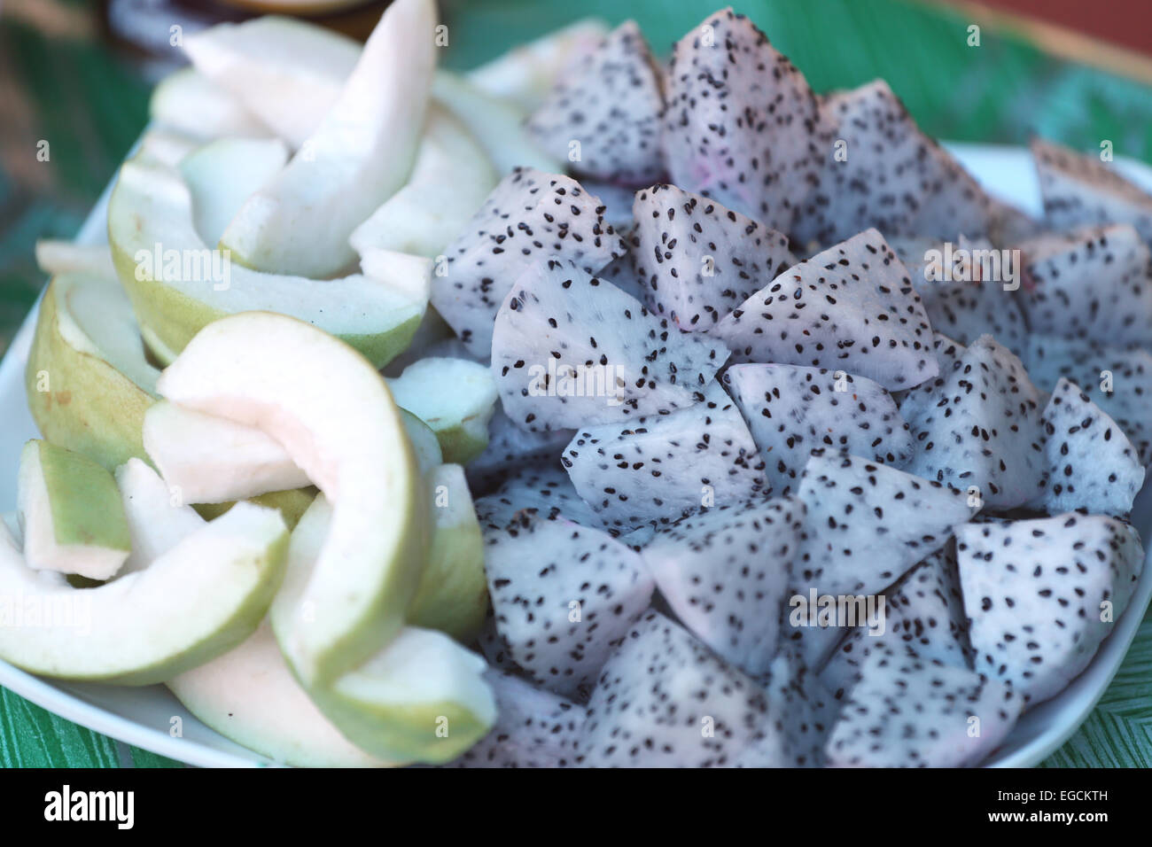 Dragon fruit of slices in dish Stock Photo - Alamy