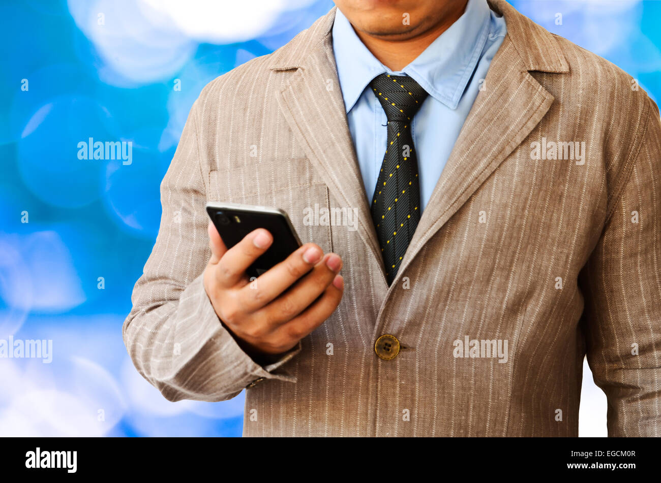 Business man working with phone on abstract light background Stock ...
