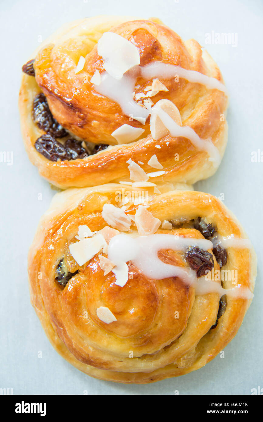 A Raisin cream roll danish and almond slice Stock Photo - Alamy