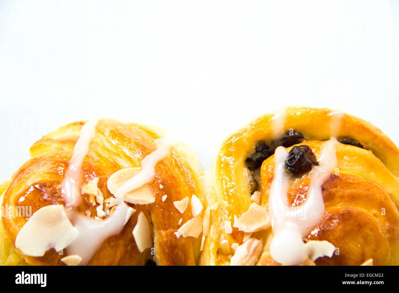 A Raisin cream roll danish and almond slice Stock Photo - Alamy