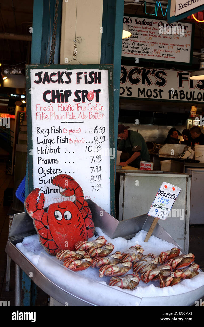 Signs price fish & chips and fresh, cooked dungeness crab at Pike Place ...