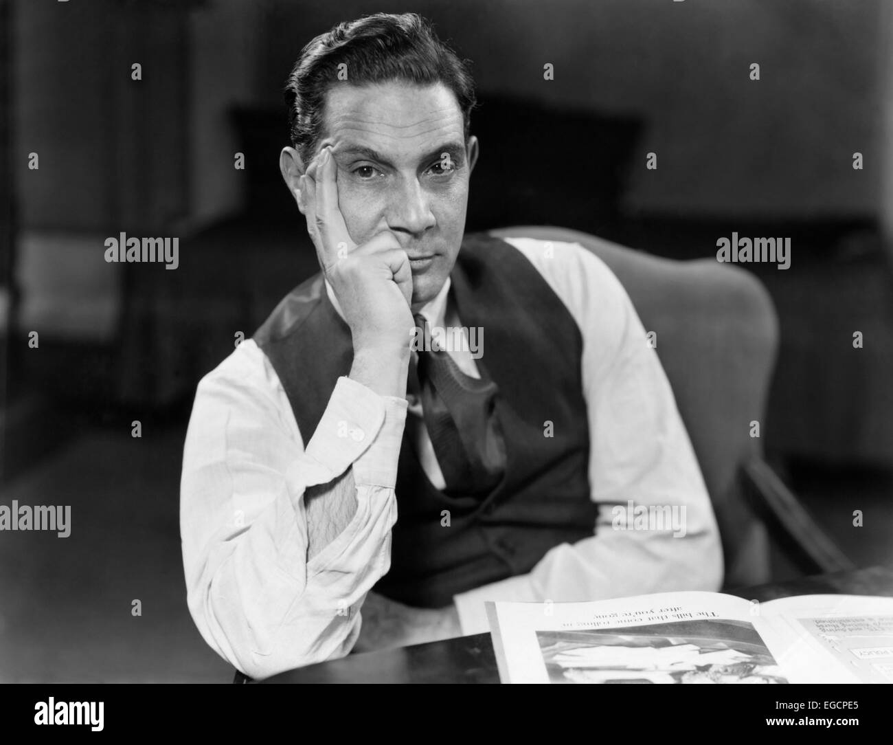 Leaning on hand Black and White Stock Photos & Images - Alamy