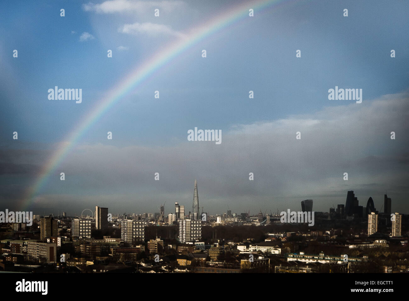 London, UK. 23rd Feb, 2015. Rainbow breaks over London after rainstorm ...
