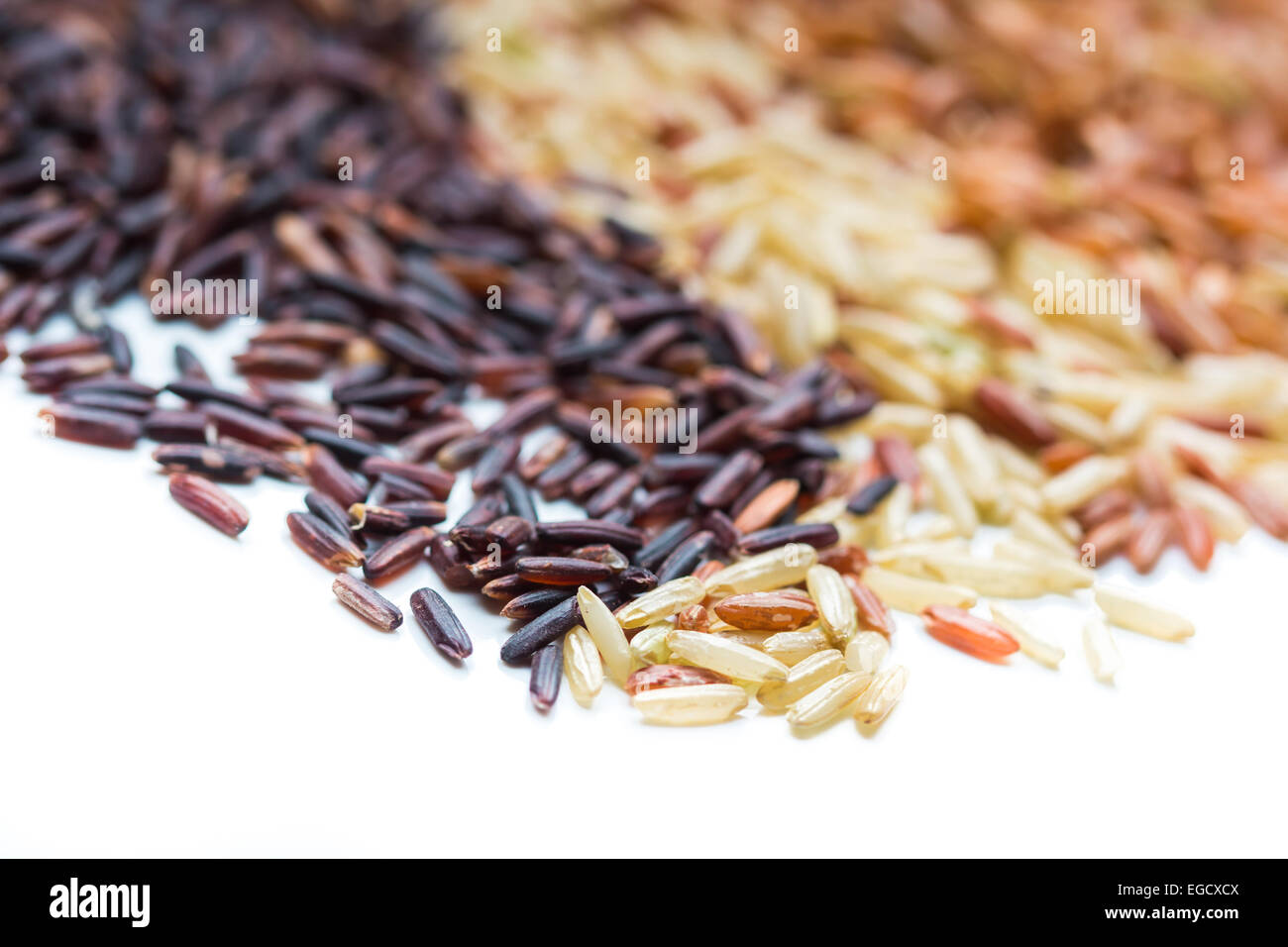 Three variety kinds of brown rice, black ,yellow and brown with copy ...