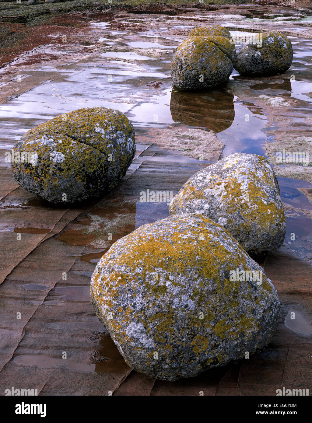 Boulders on the shore at Pirate's Cove, Corrie, Arran, Scotland Stock ...