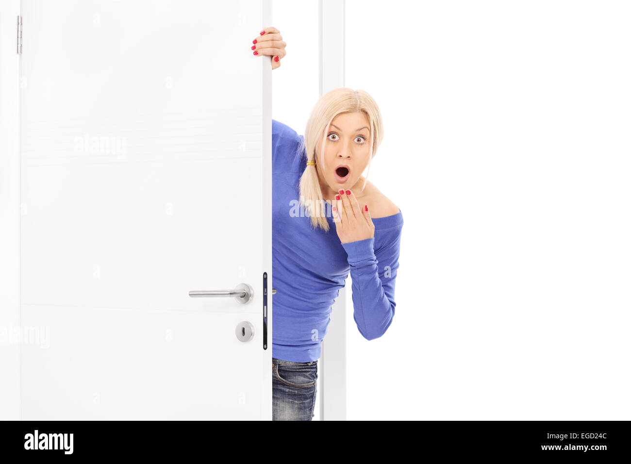 Shocked girl walking into a room isolated on white background Stock ...