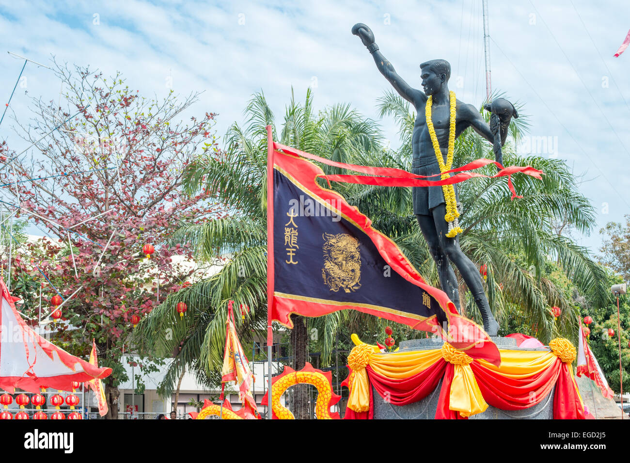 Statue of a Thai boxer decorated for Chinese New Year celebrations in ...