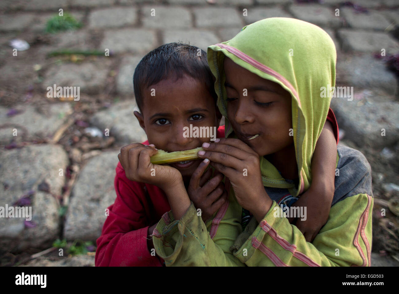 Children Sharing Food To The Poor