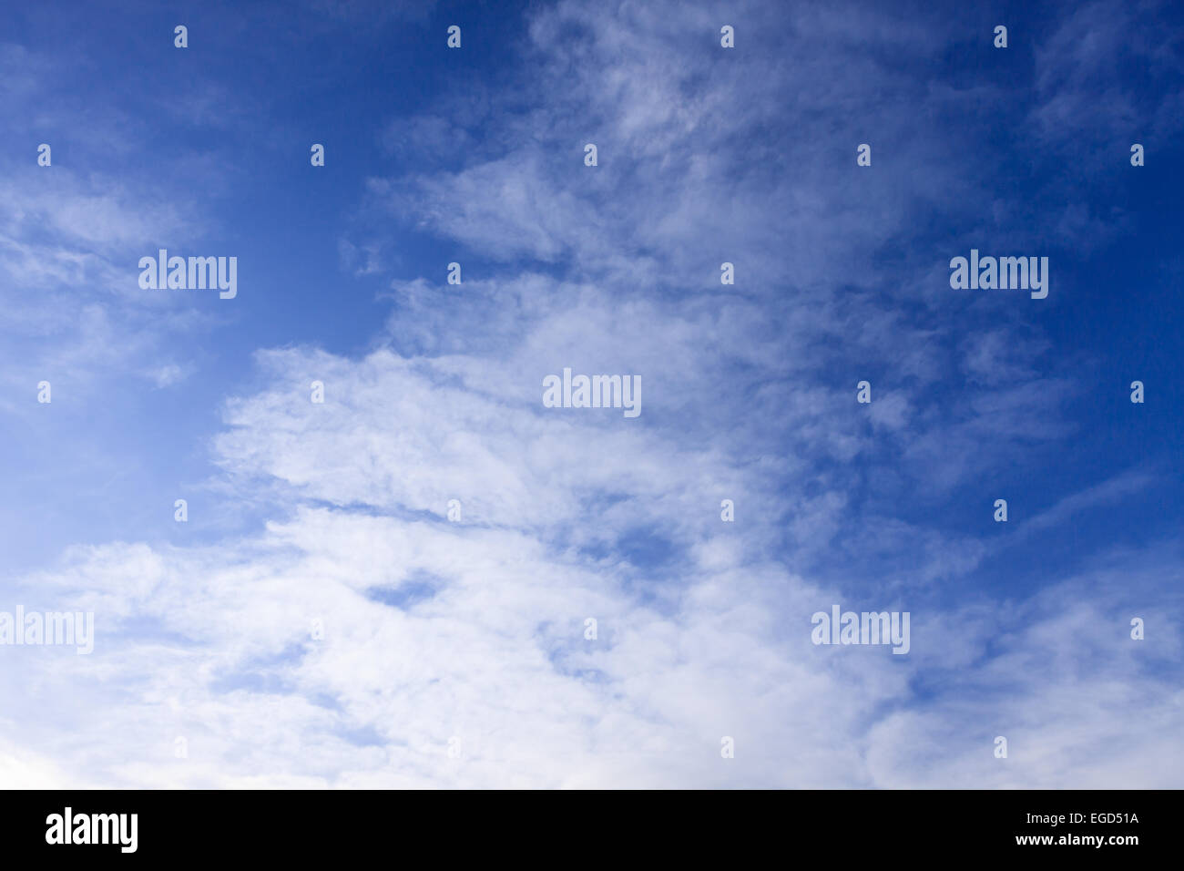 Cloudy blue sky background Stock Photo - Alamy