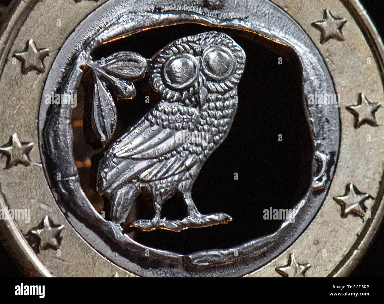 ILLUSTRATION - A piece of art made from a Greek euro coin is seen in ...