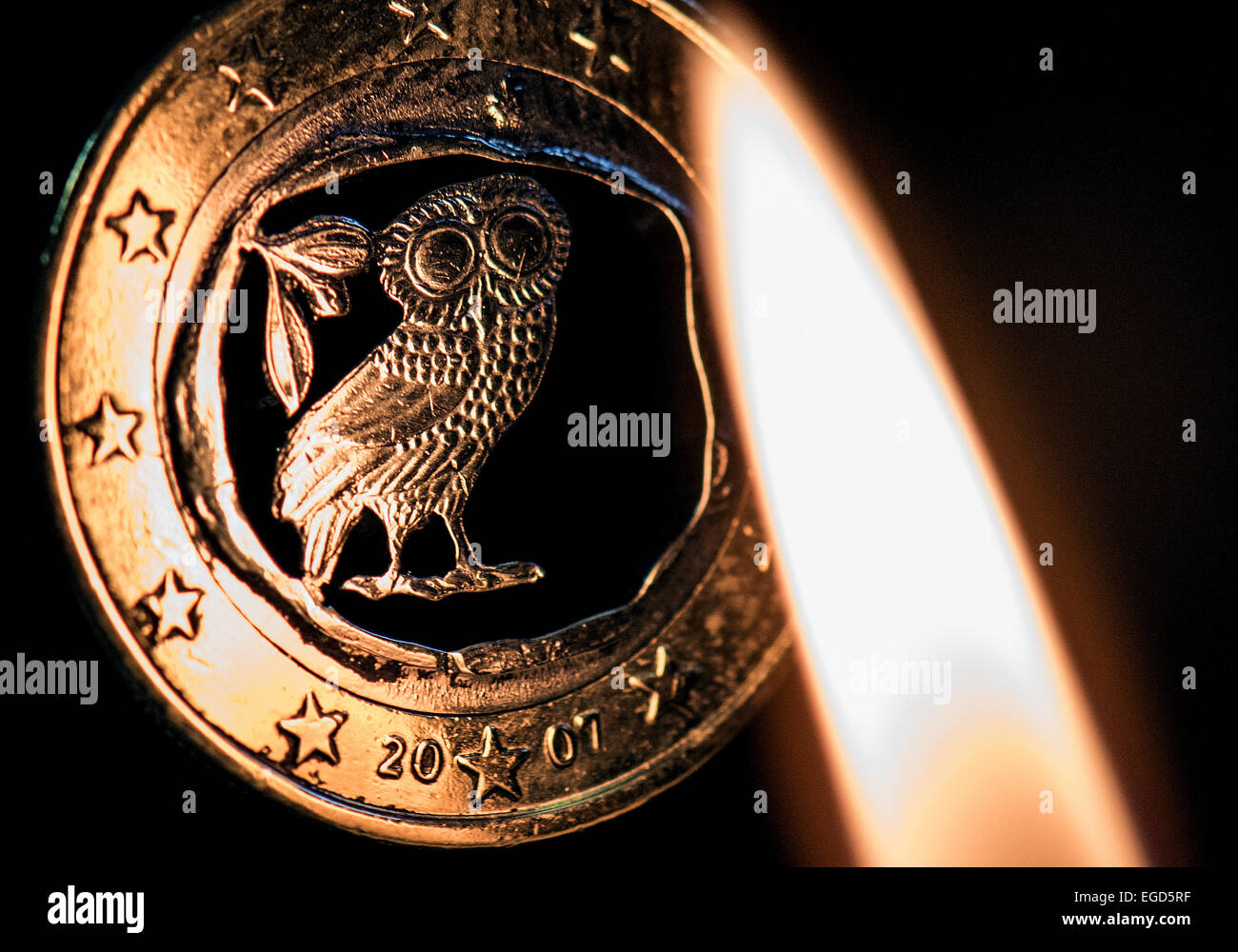 ILLUSTRATION - A piece of art made from a Greek euro coin is seen in ...